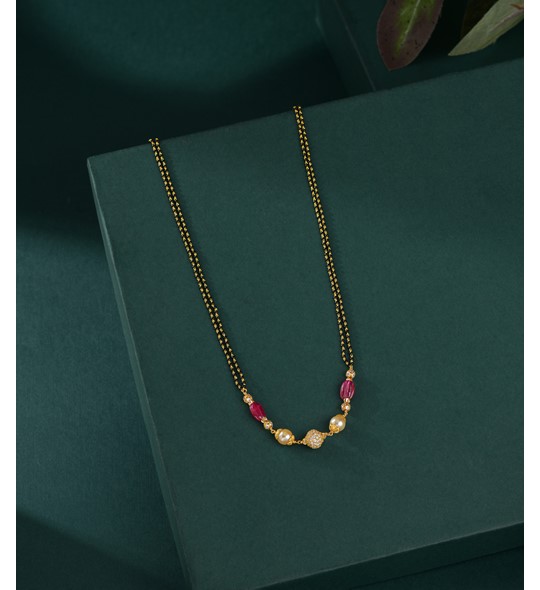 Add elegance to your attire with our stunning gold mangalsutra ...